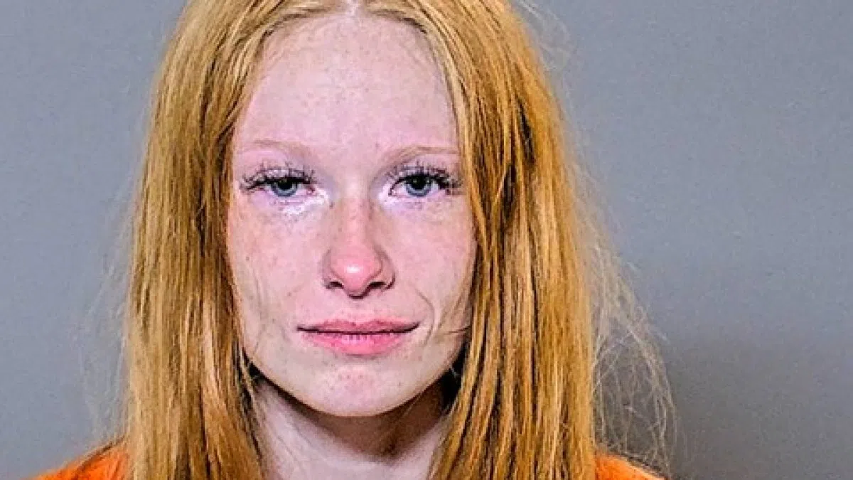 Charges filed against woman accused of running over police officer ...