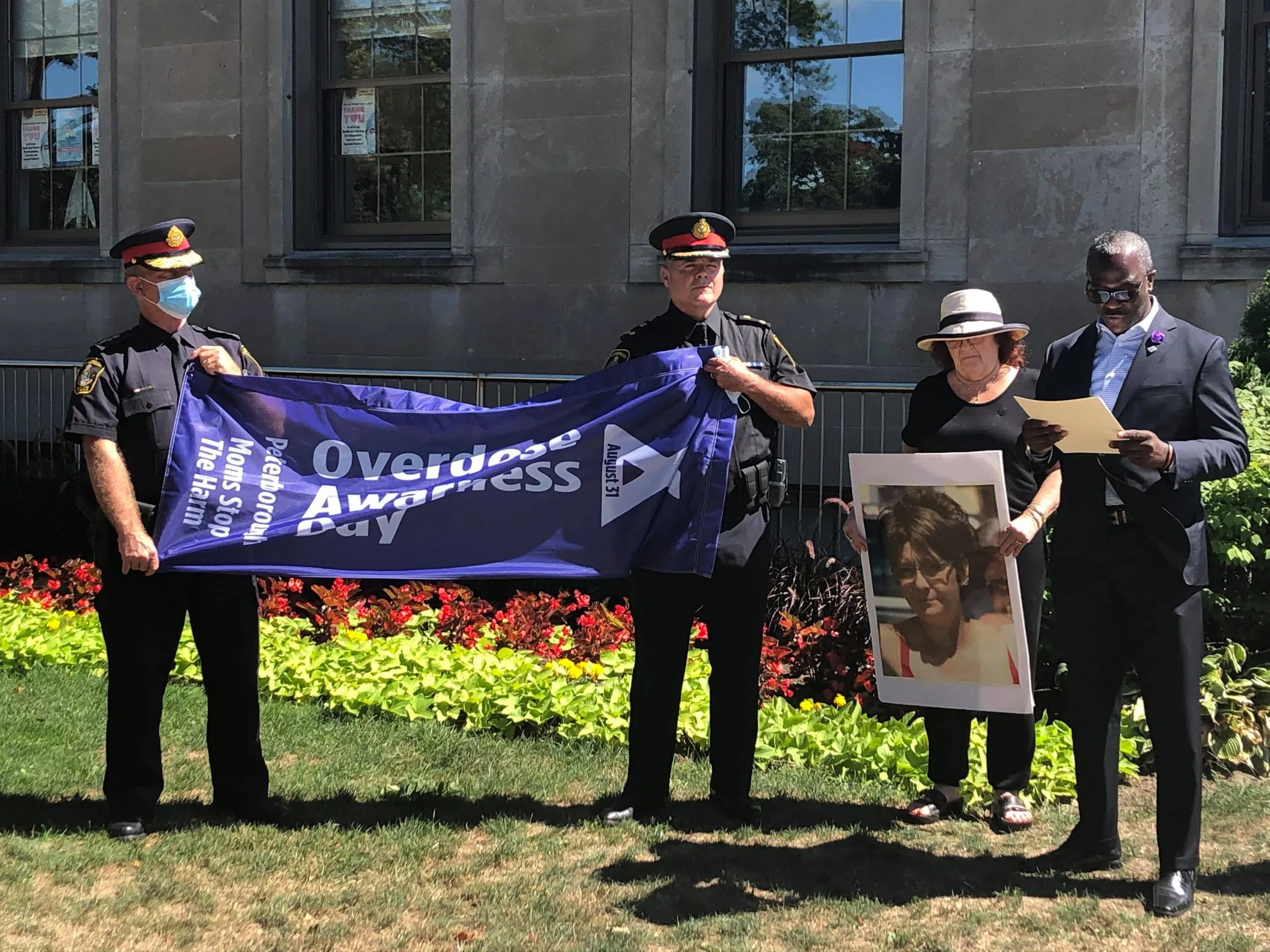 Overdose Awareness Day flags raised at City Hall, Peterborough Police ...