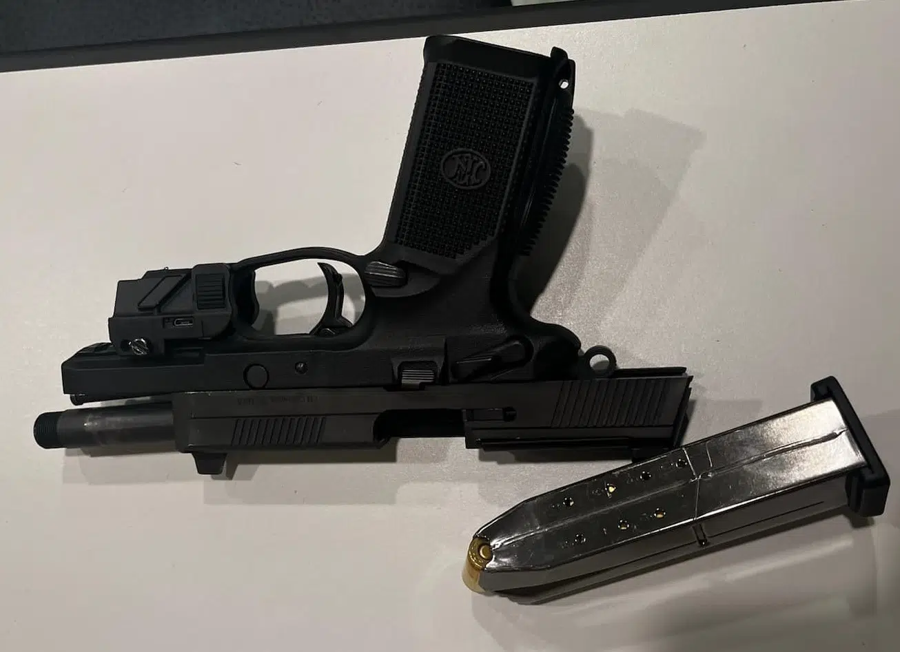 Four charged after gun uncovered in Perth traffic stop ...