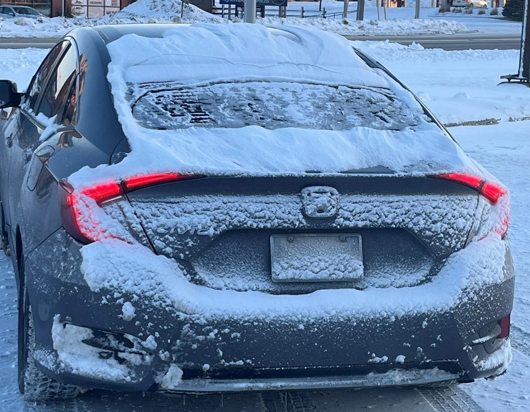 Driver charged after snow-covered licence plate spotted in St. Thomas ...