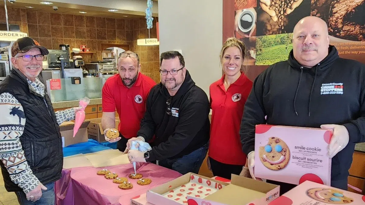 Lanark OPP, Crime Stoppers all smiles at Carleton Place Tim Hortons ...