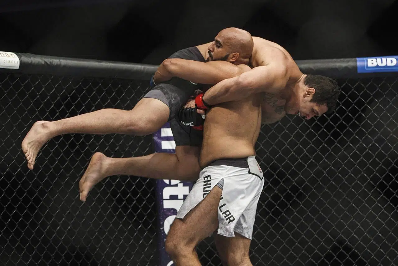 Former Canadian Olympic wrestler savours life as a heavyweight in the ...