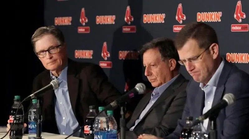 Red Sox stripped of pick, Cora banned in sign stealing scams ...