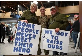 Happy Hooligan members arriving in Fargo reunite with family and ...