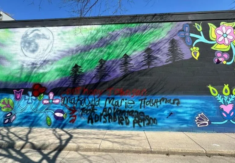 Mural outside Bernie’s Wines & Liquors vandalized with spray paint ...