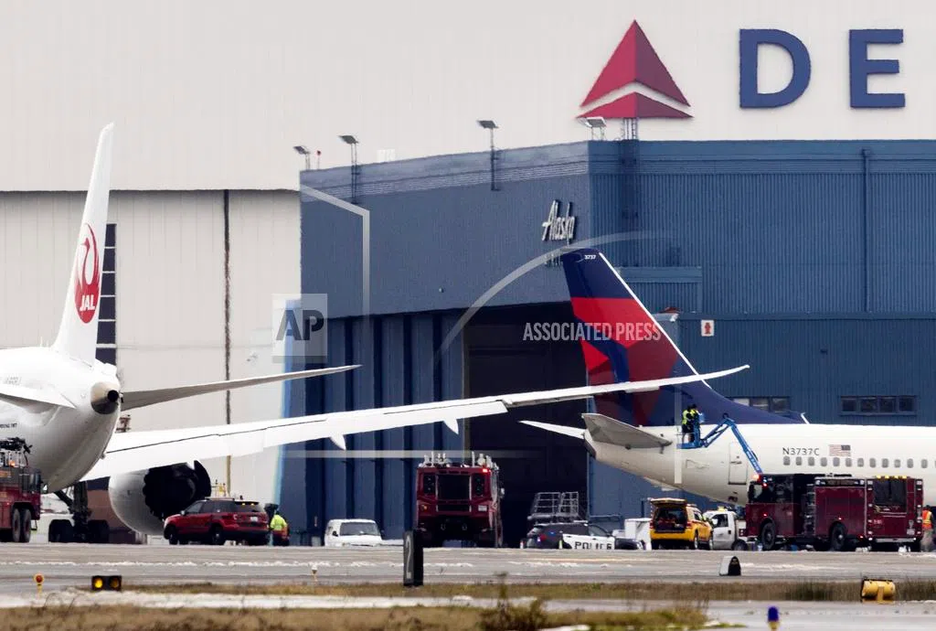 Japan Airlines Plane Hits Delta Plane Tail at SeaTac International ...
