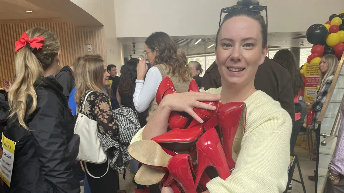 People strut their stuff for YWCA’s Walk A Mile in Their Shoes | 980 CJME