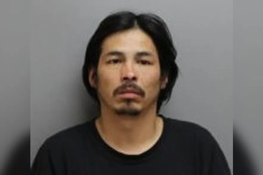 One man arrested, one man wanted after armed home invasion on Sask ...