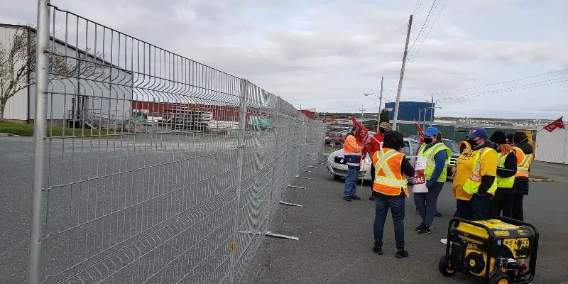 Striking Dominion Workers Put Up Fence at Company Warehouse | VOCM